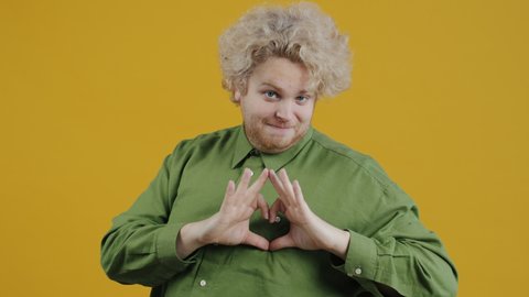 Portrait Attractive Guy Making Heart Hand Stock Footage Video (100% ...