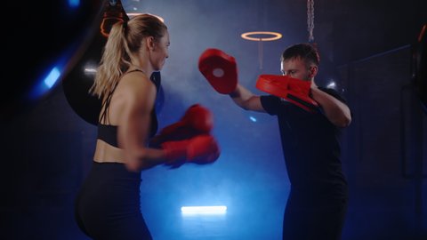 Boxing Training Woman Boxing Her Coach Stock Footage Video (100% Royalty-free) 1094183549 ...