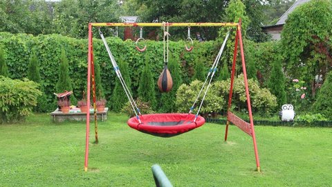 Empty Red Swing Rain Stock Footage Video (100% Royalty-free) 1094306915 ...