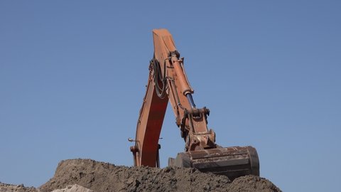 Excavator Digs Earth Bucket On Sky Stock Footage Video (100% Royalty ...