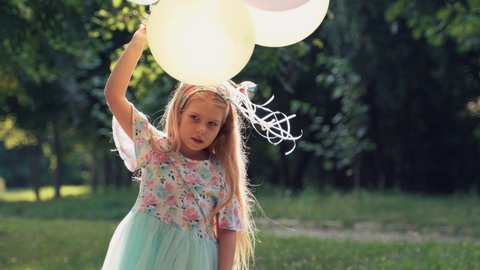 Little Girl Plays Spinning Balloons Her Stock Footage Video (100% ...