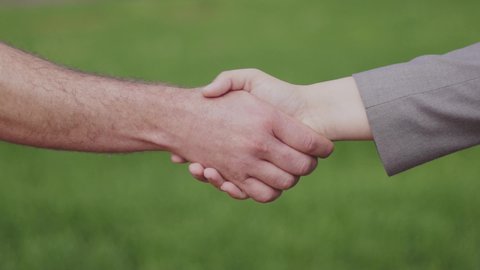Handshake People Open Environment Grass Background Stock Footage Video ...
