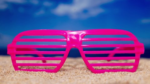 Pair Pink Plastic Slit Sunglasses On Stock Footage Video (100% Royalty ...
