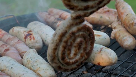 Man Grilling Rotating Meat Sausages 4k Stock Footage Video (100% ...
