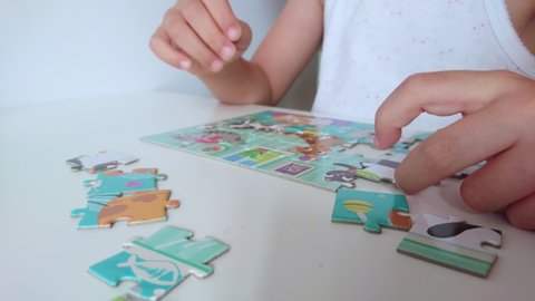 Little Child Picks Picture Pieces Puzzles Stock Footage Video (100% ...