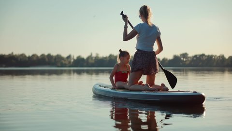 Stand Paddle Boarding Sup Mother Daughter Stock Footage Video (100% ...