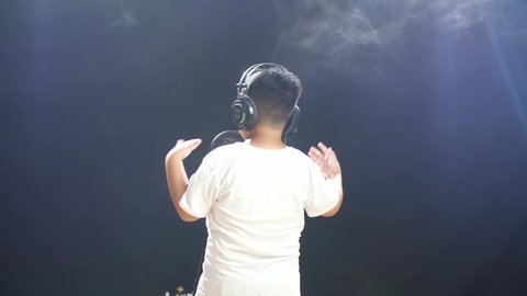 Back View Young Boy Headphone Rapping Stock Footage Video (100% Royalty ...