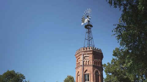 Old Red Brick Water Tower Windmill Stock Footage Video (100% Royalty ...