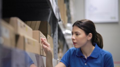 Young Female Worker Blue Uniform Checklist Stock Footage Video (100% ...