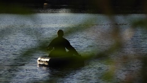 Man Floats Inflatable Boat Rowing Bums Stock Footage Video (100% ...