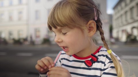 Little Girl Eating Tasteless Jelly Candy Stock Footage Video (100% ...