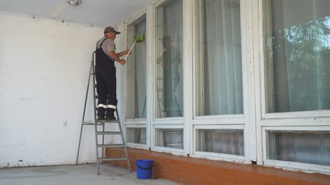 Man Window Cleaner Wets Rag On Stock Footage Video (100% Royalty-free ...