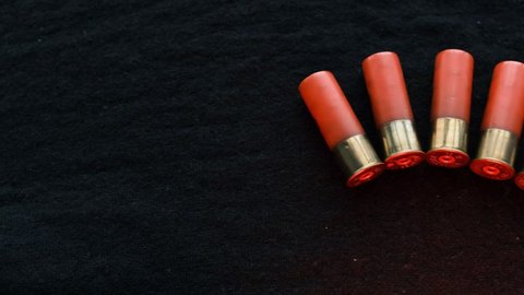 Red Shotgun Shells On Black Surface Stock Footage Video (100% Royalty ...