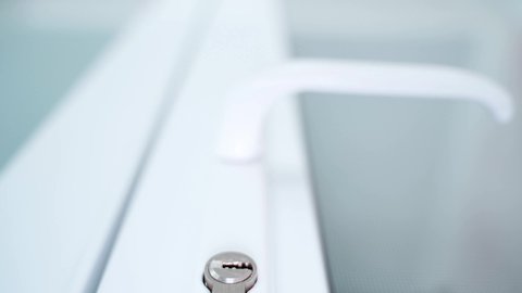 Hand Inserts Perforated Key Into Keyhole Stock Footage Video (100% ...
