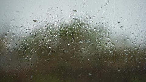 Raindrops Falling On Window On Blurry Stock Footage Video (100% Royalty ...