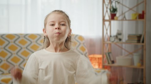 Funny Girl Blowing Cheeks Static Shot Stock Footage Video (100% Royalty ...