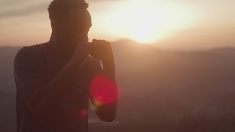 Silhouetted Athlete Shadow Boxes On Hilltop Stock Footage Video (100% ...