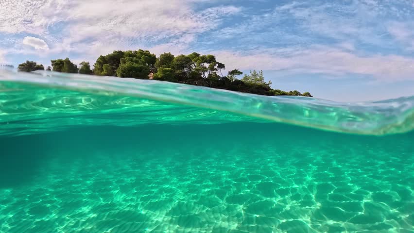 Half Underwater Stock Footage ~ Royalty Free Stock Videos | Pond5