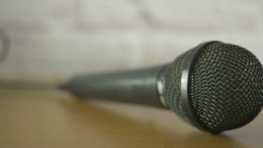 professional microphone on table camera panning Stock Footage Video ...
