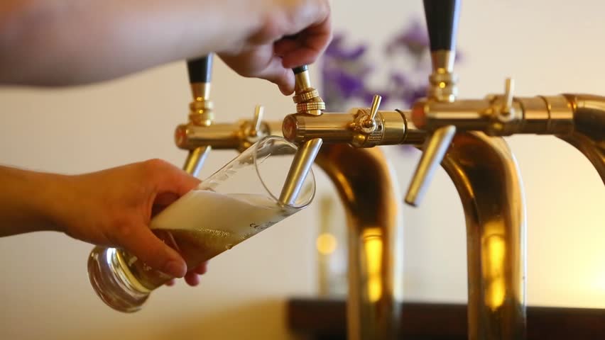 Barman´s Hands Pulling Pint of Stock Footage Video (100% Royalty-free ...