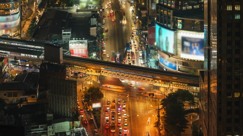 Timelapse video of fast motion of cars on city roads illuminated with ...