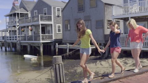 Girls Walk Single File Along Sea Stock Footage Video (100% Royalty-free ...