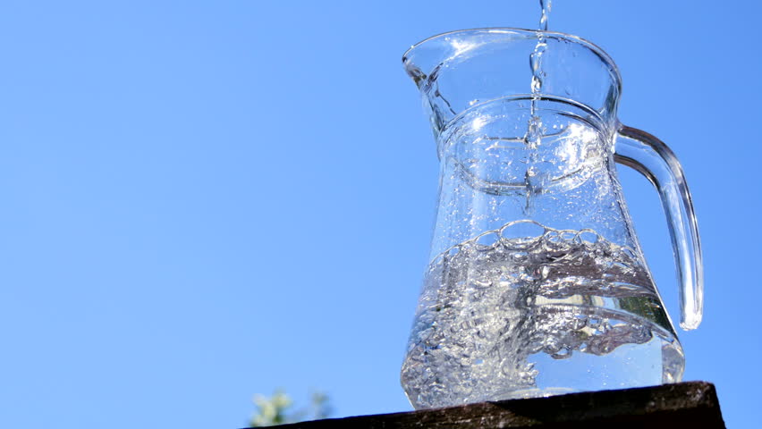 clean glass jar filled water against Stock Footage Video (100% Royalty ...