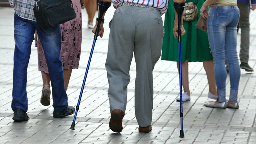 cripple's silhouette crutches feet healthy people Stock Footage Video ...