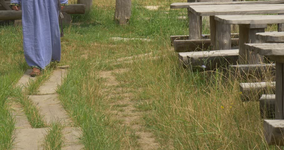 Pathway beside wooden tables Stock Video Footage - 4K and HD Video ...