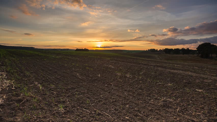 Sunset Over Plowed Field. Full Stock Footage Video (100% Royalty-free ...