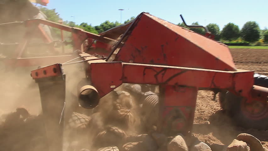 mechanical rake gather stones land - Stock Footage Video (100% Royalty ...