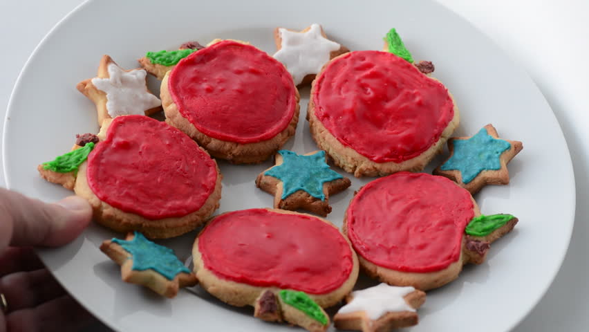 Man Hand Serving Sweet Cutout Cookies Stock Footage Video (100% Royalty ...