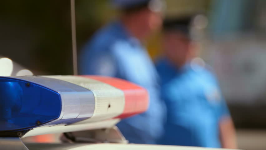 police car on city road background Stock Footage Video (100% Royalty ...