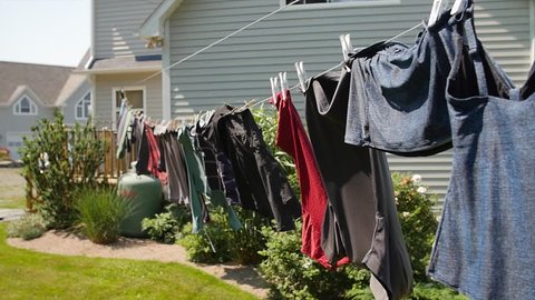 clothes drying wind on clothesline outside Stock Footage Video (100% ...