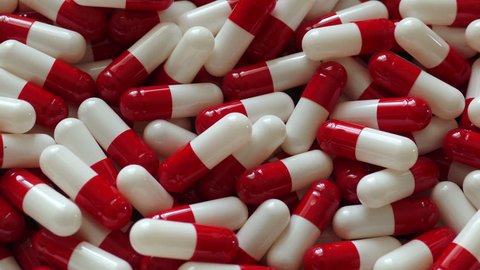 Close Red Medical Capsules Isolated On Stock Photo 130189067 | Shutterstock