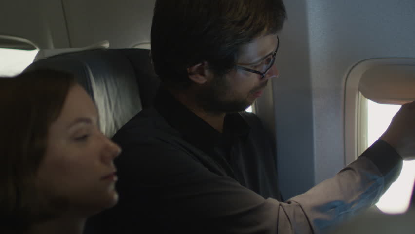 young man closes window shade on Stock Footage Video (100% Royalty-free ...