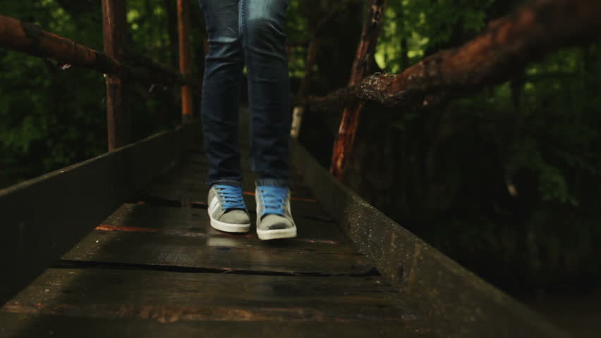 girl feet walking on bridge close-up Stock Footage Video (100% Royalty ...