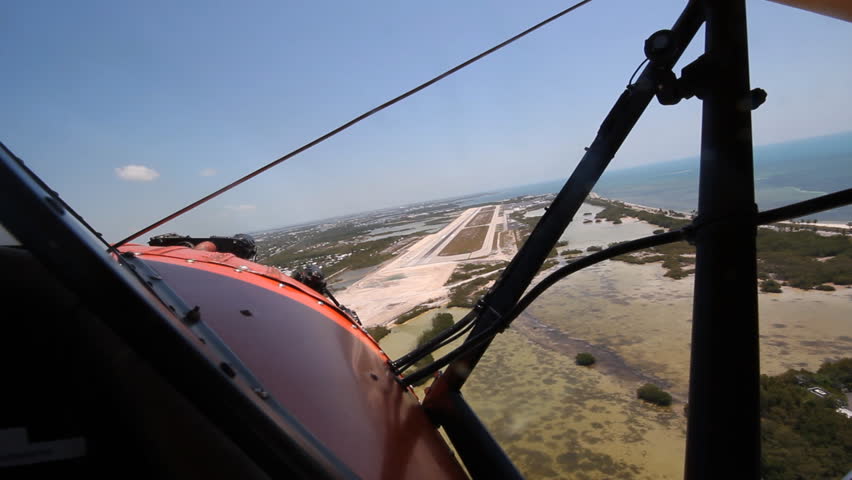 biplane landing 1 2 shot front Stock Footage Video (100% Royalty-free ...