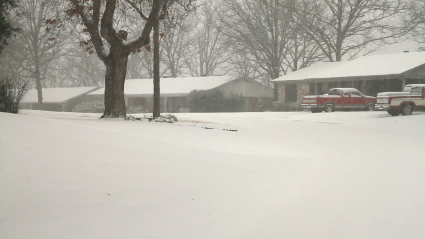 snow falling on suburban neighborhood street Stock Footage Video (100% ...