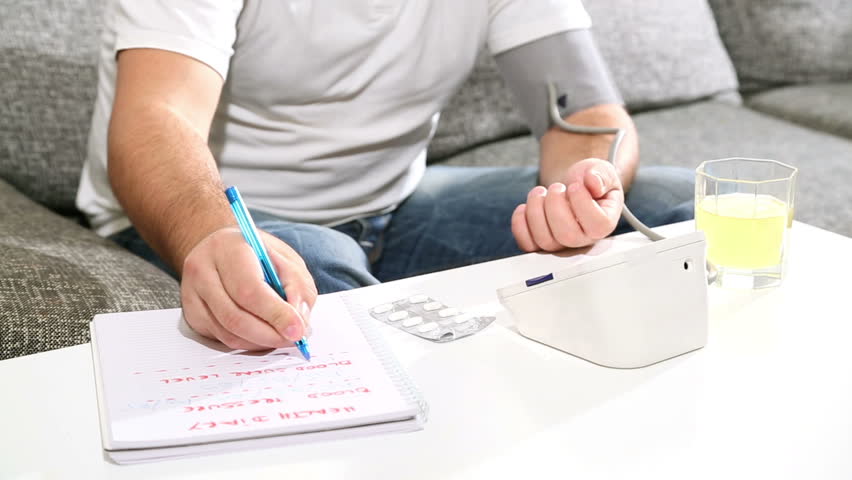 man writing down his results blood Stock Footage Video (100% Royalty ...