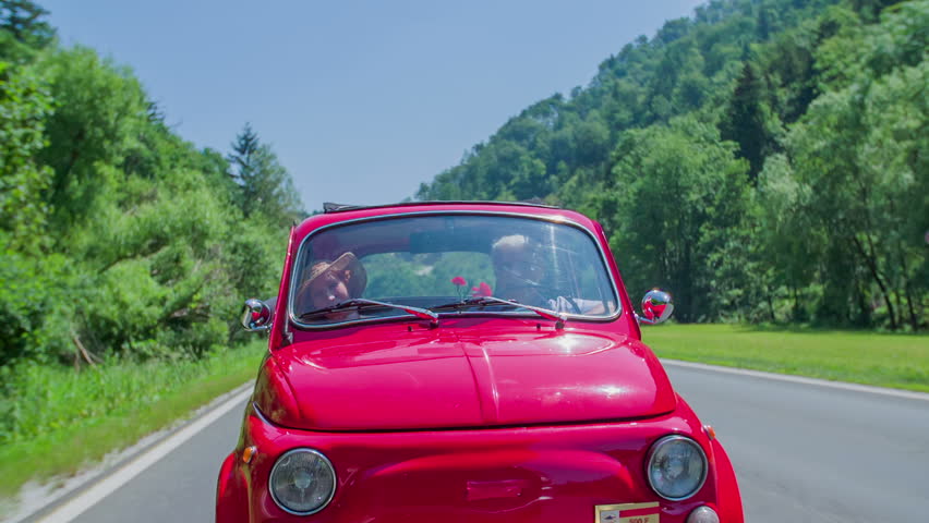 Red Yugo Driving On a Stock Footage Video (100% Royalty-free) 12511616 ...