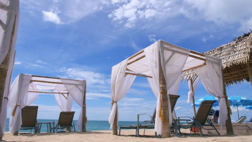 tropical beach resort lounge chairs sea: video de stock (totalmente ...
