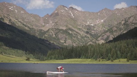 Man Falls Off Paddle Board Mountain Stock Footage Video (100% Royalty ...