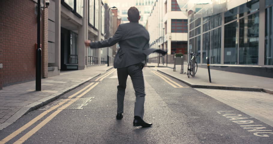 man running middle street background shot Stock Footage Video (100% ...