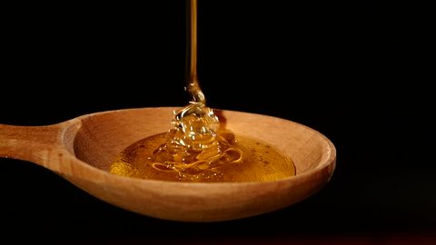 Photograph Ghee Pouring Spoon Stock Photo (Edit Now) 1973414111