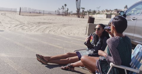 Two Black Girlfriends Sitting Beach Chairs Stock Footage Video (100% ...