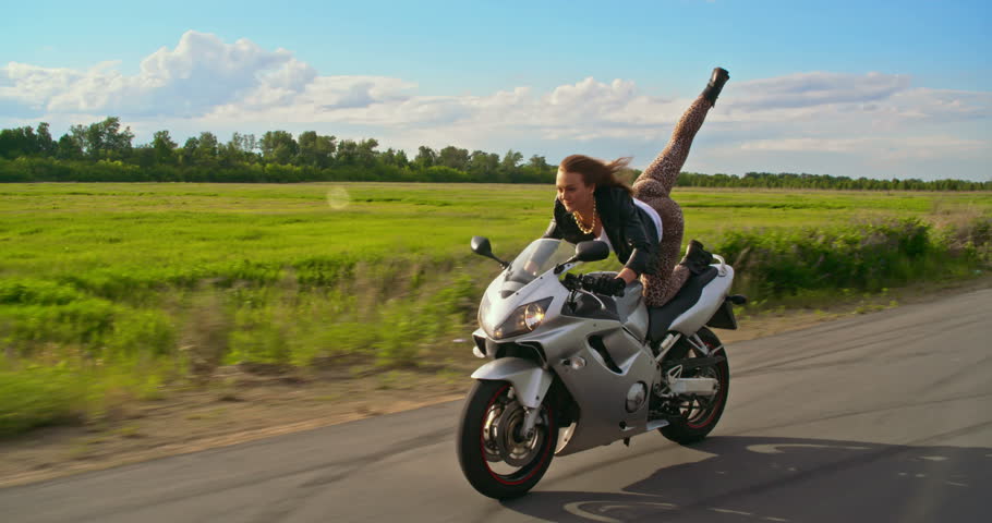 talented girl performing motorbike trick on Stock Footage Video (100% ...