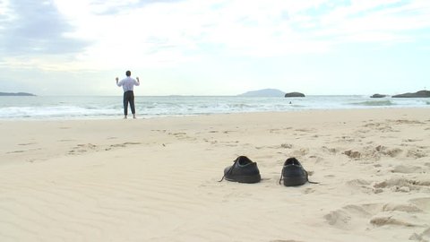 Businessman Walking Without Shoes On Beach Stock Footage Video (100% ...