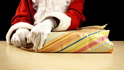 Santa Claus Wrapping Gift Fancy Paper Stock Footage Video (100% Royalty ...
