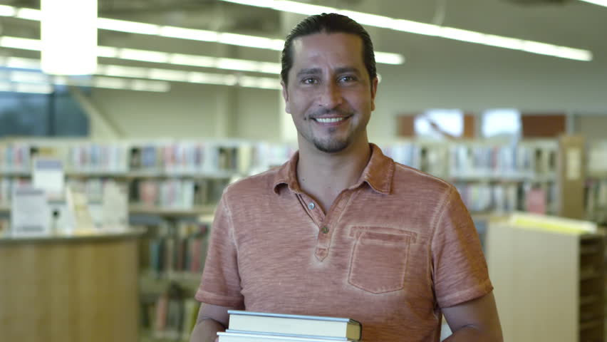 Portrait of Man Holding Library Stock Footage Video (100% Royalty-free ...